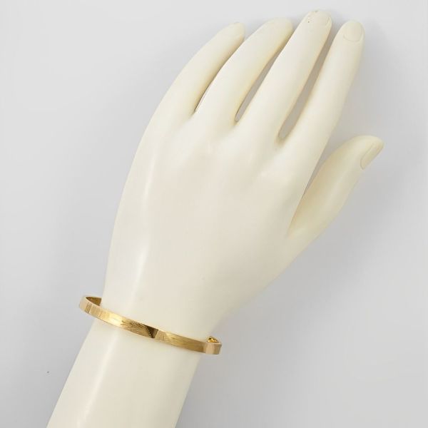 EternaGold 14K Gold Textured Leaf Design Bangle Costa Rica Arabella Bianco