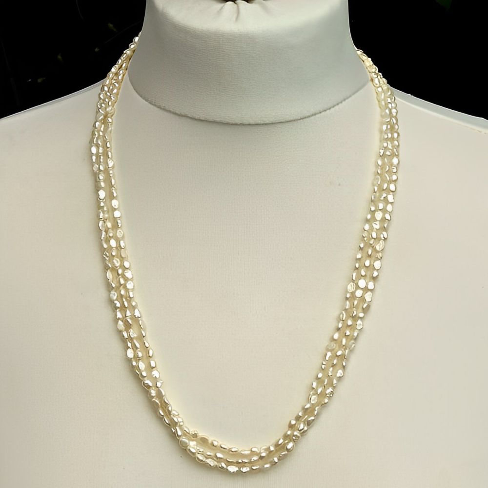 Three Strand Baroque Rice Pearl Necklace Circa 1970s Arabella Bianco